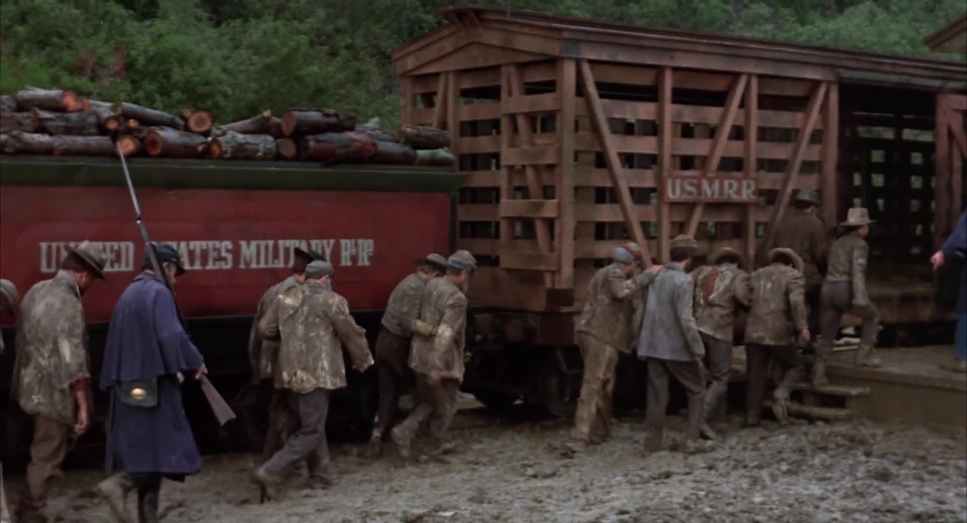 Go on inside.Keep those men moving back there. All right, move along ...