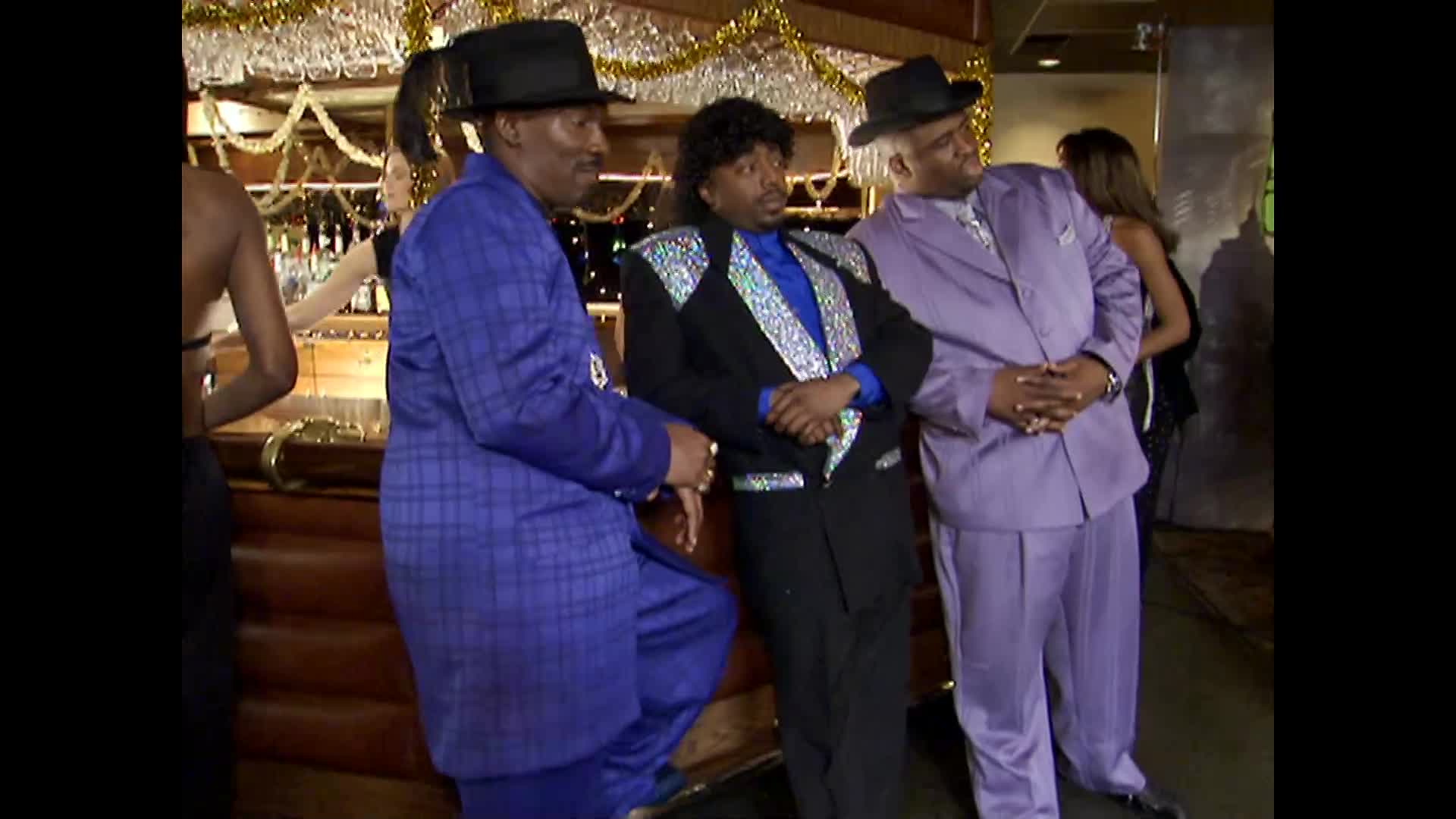 Man, you should take that cane, and beat whoever made that suit to ...