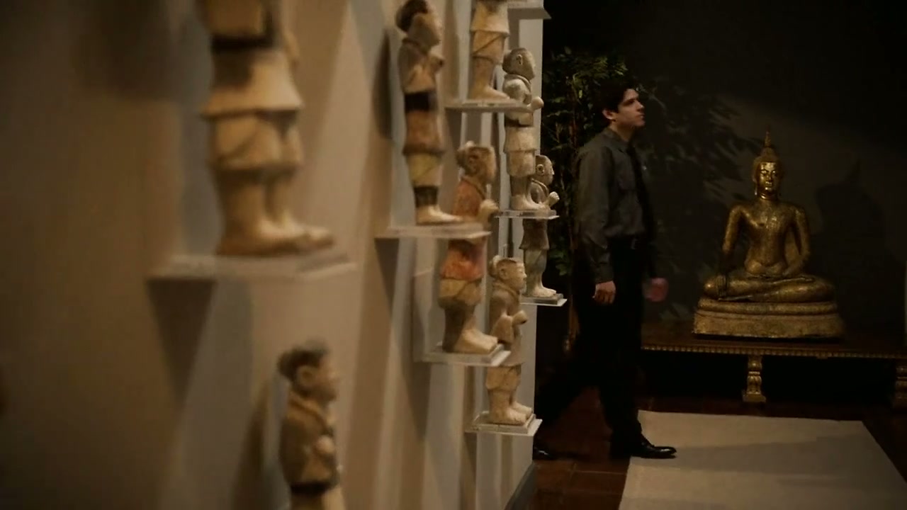 Museum security guards movedthrough the building locking doors,turning ...