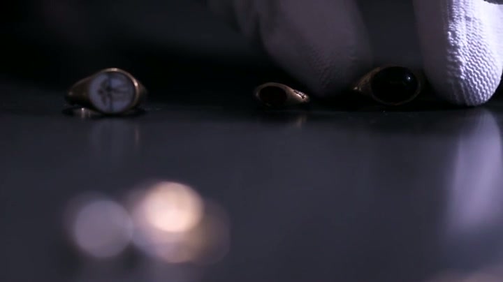 We've got these beautifulexamples of gold rings, Set with gemstones ...