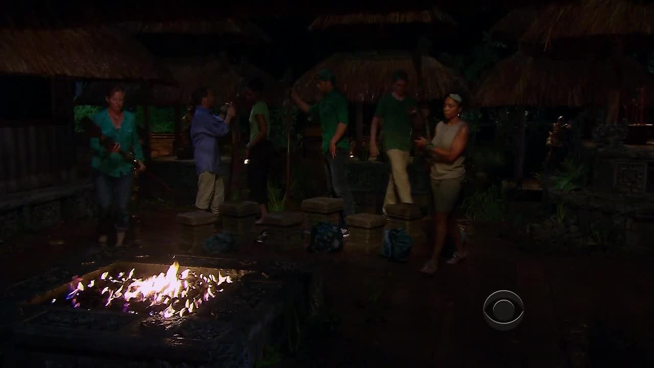 Behind you there is a torch, pick one, closer to the fire and on. This ...