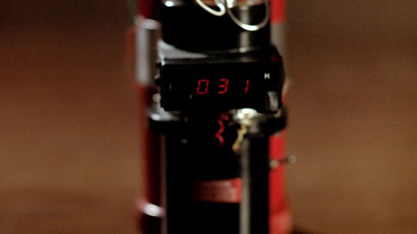 Disconnected the timing devicefrom the detonator switch. - Wonder Woman ...