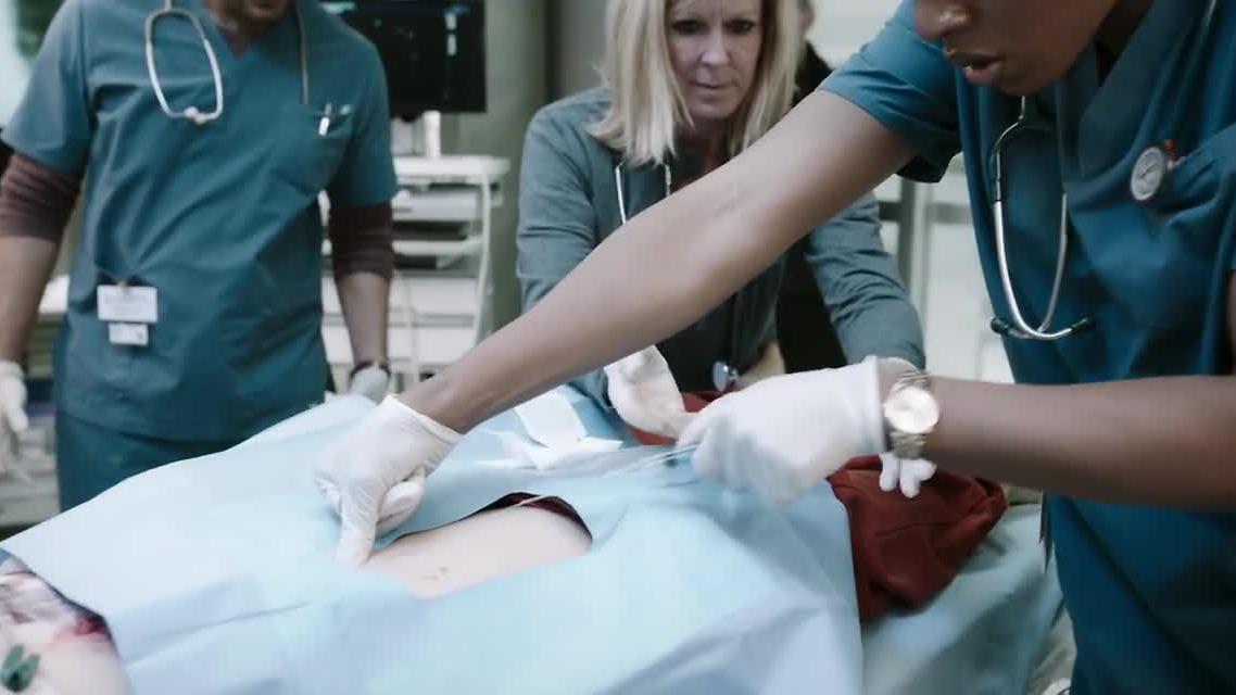 Inserting introducer sheath. Alright... - Inserting REBOA.- Mm-hmm ...
