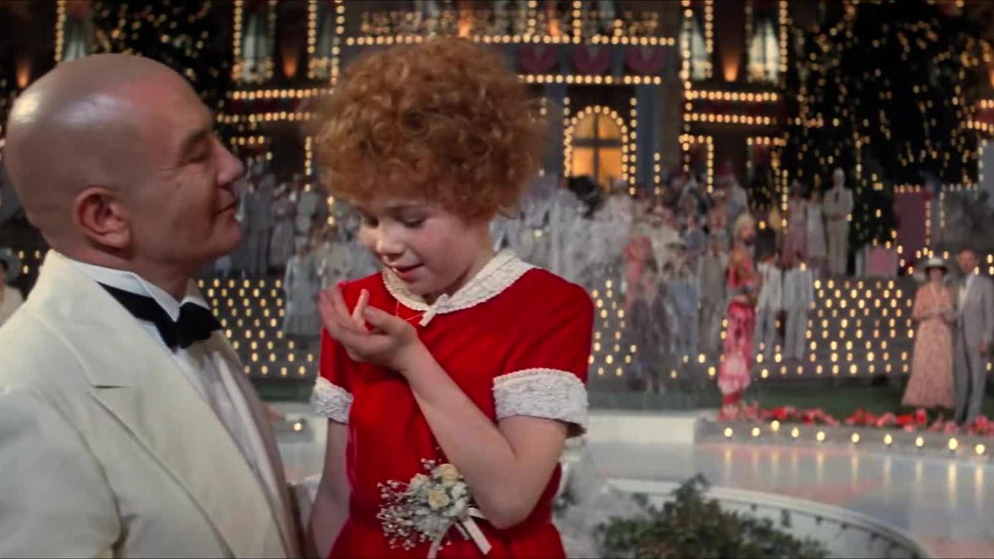"To Annie. With love." I love you, Daddy Warbucks. I love you, Daddy ...