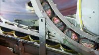 A COMPRESSION WHEELPRESSES THE LIDS IN PLACE WITH JUST THE RIGHT ...