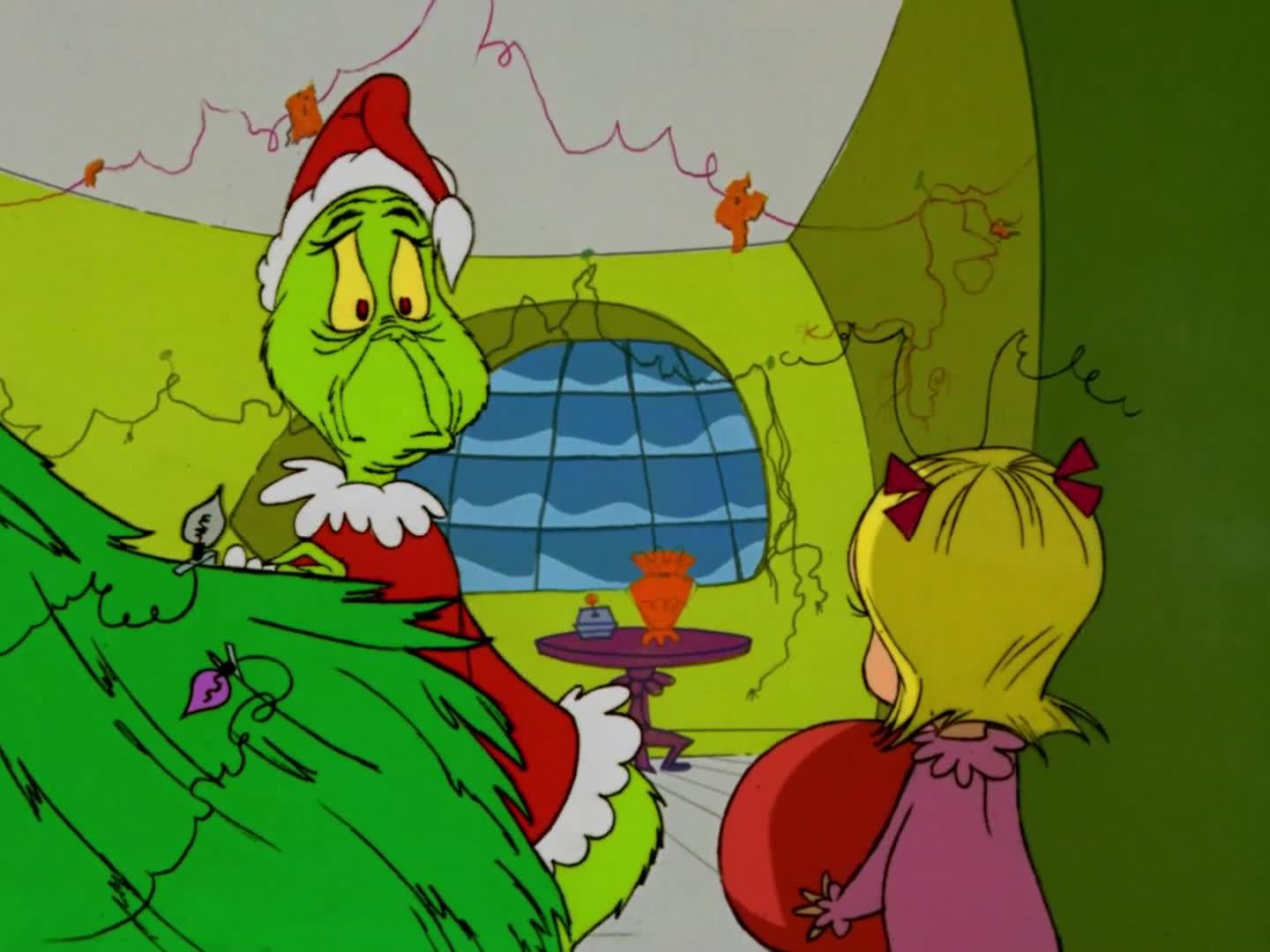 As the Grinch took the tree, as he started to shove, he heard a small ...