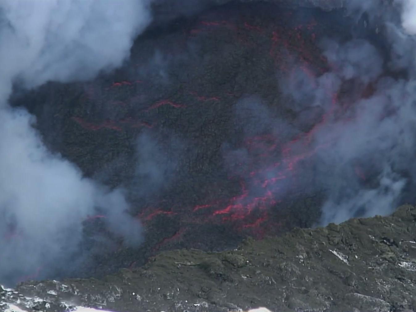 This close to the boiling magma,which frequently explodes, we were ...